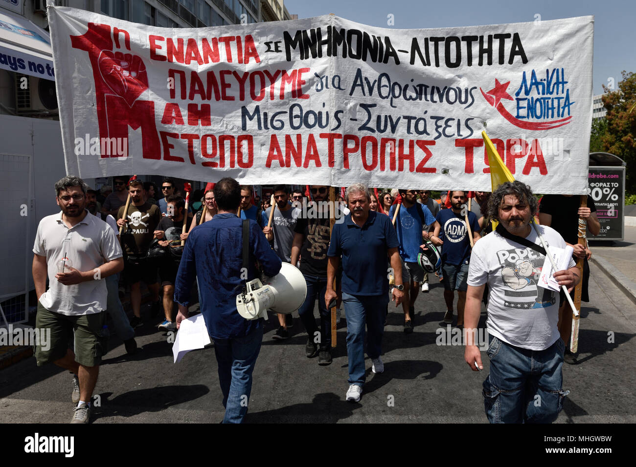 Athens, Greece. 1st May 2018. Protesters march holding a banner during ...