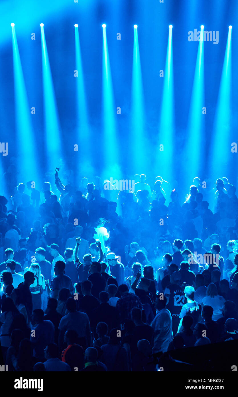 30 April 2018, Germany, Dortmund: techno fans dancing in the ...