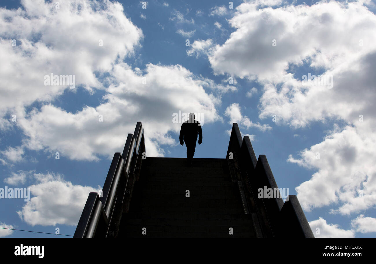 01 May 2018, Germany, Thuringia: A man climbing the stairs of the ...