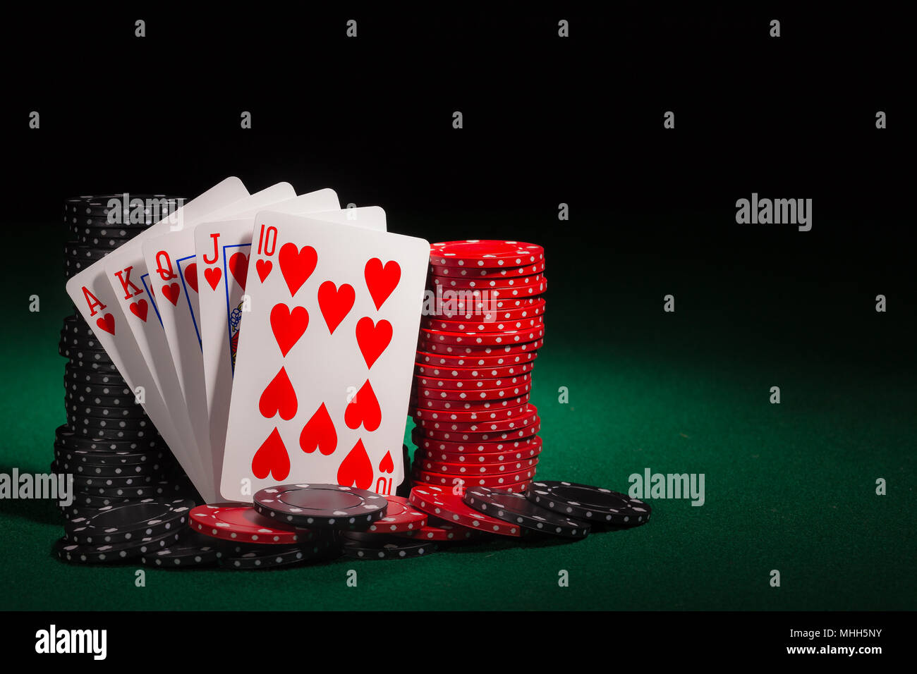 Winning card hands. Copy space Stock Photo - Alamy