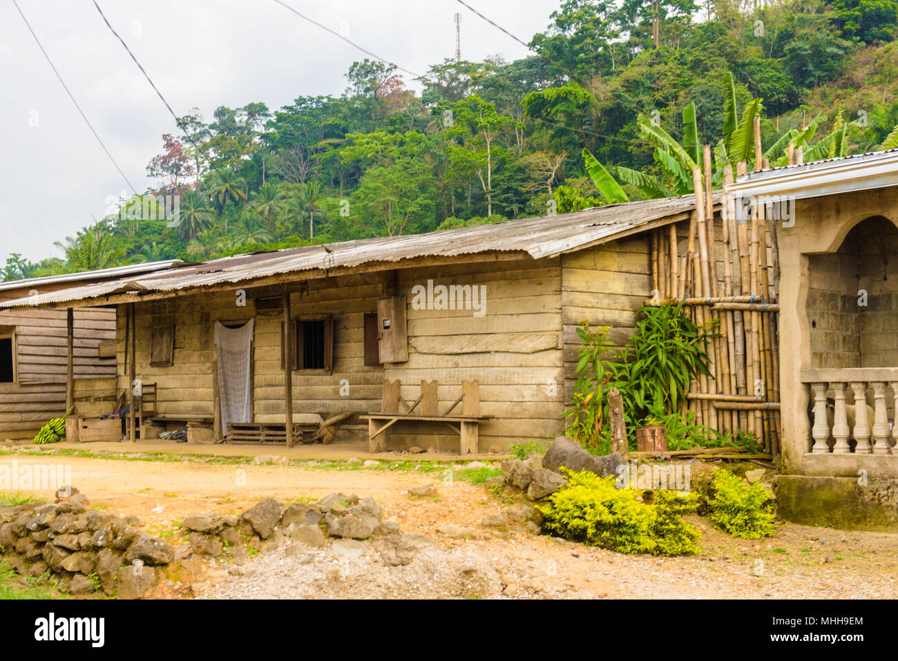 Destroyed cabins in the jungle Stock Photo - Alamy