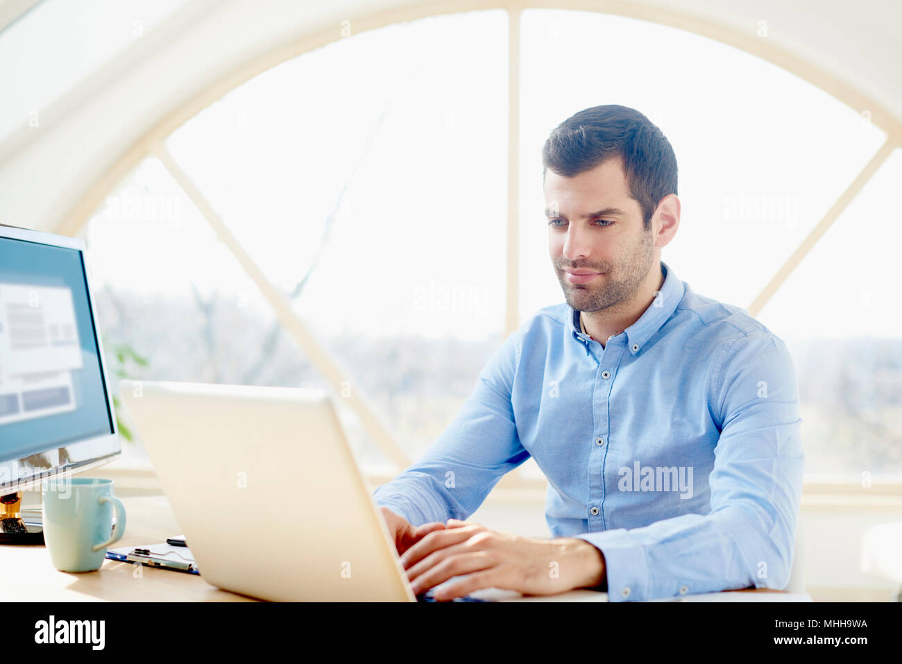 Person Working On Computer Behind High Resolution Stock Photography and ...