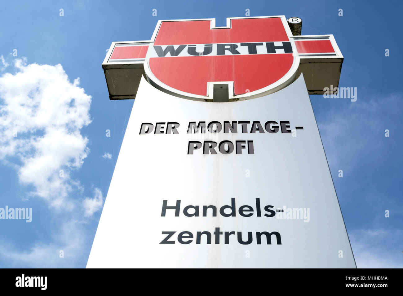 Würth sign against blue sky. The Würth Group is world market leader in ...