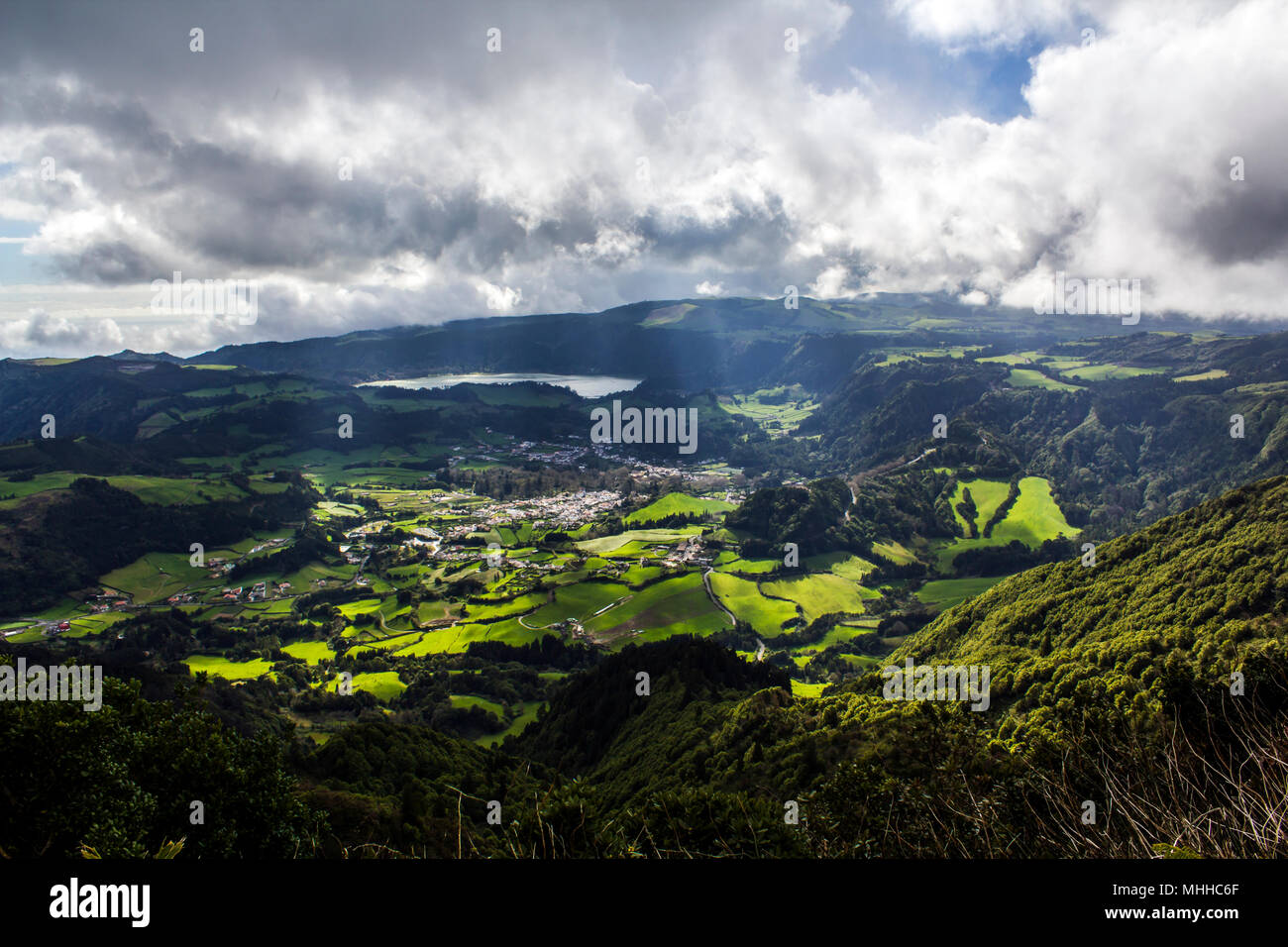 Stunning Landscape with farm fields, green hills, village and a lagoon ...