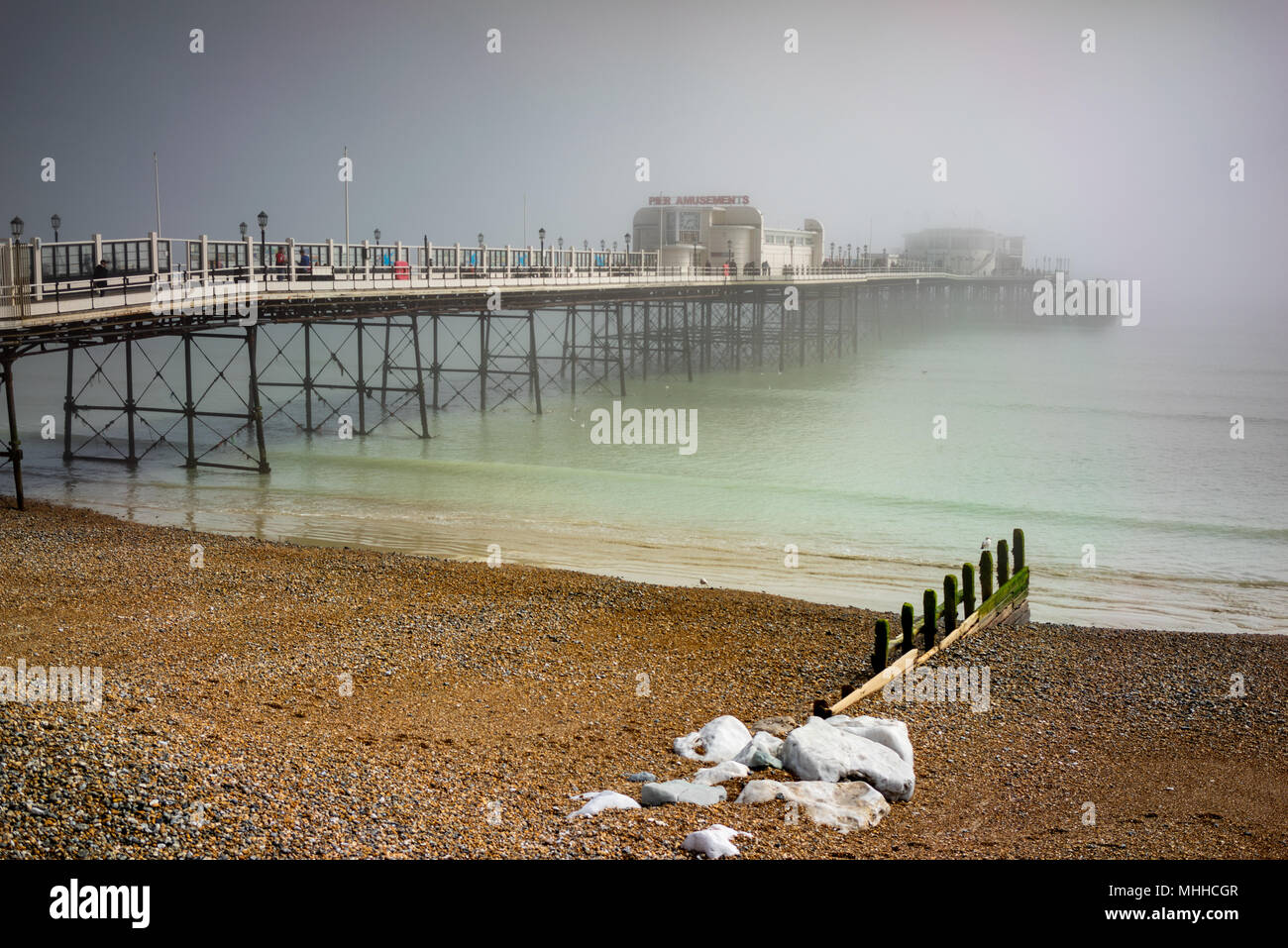 The Victorian pier in Worthing West Sussex, England on a misty day in ...