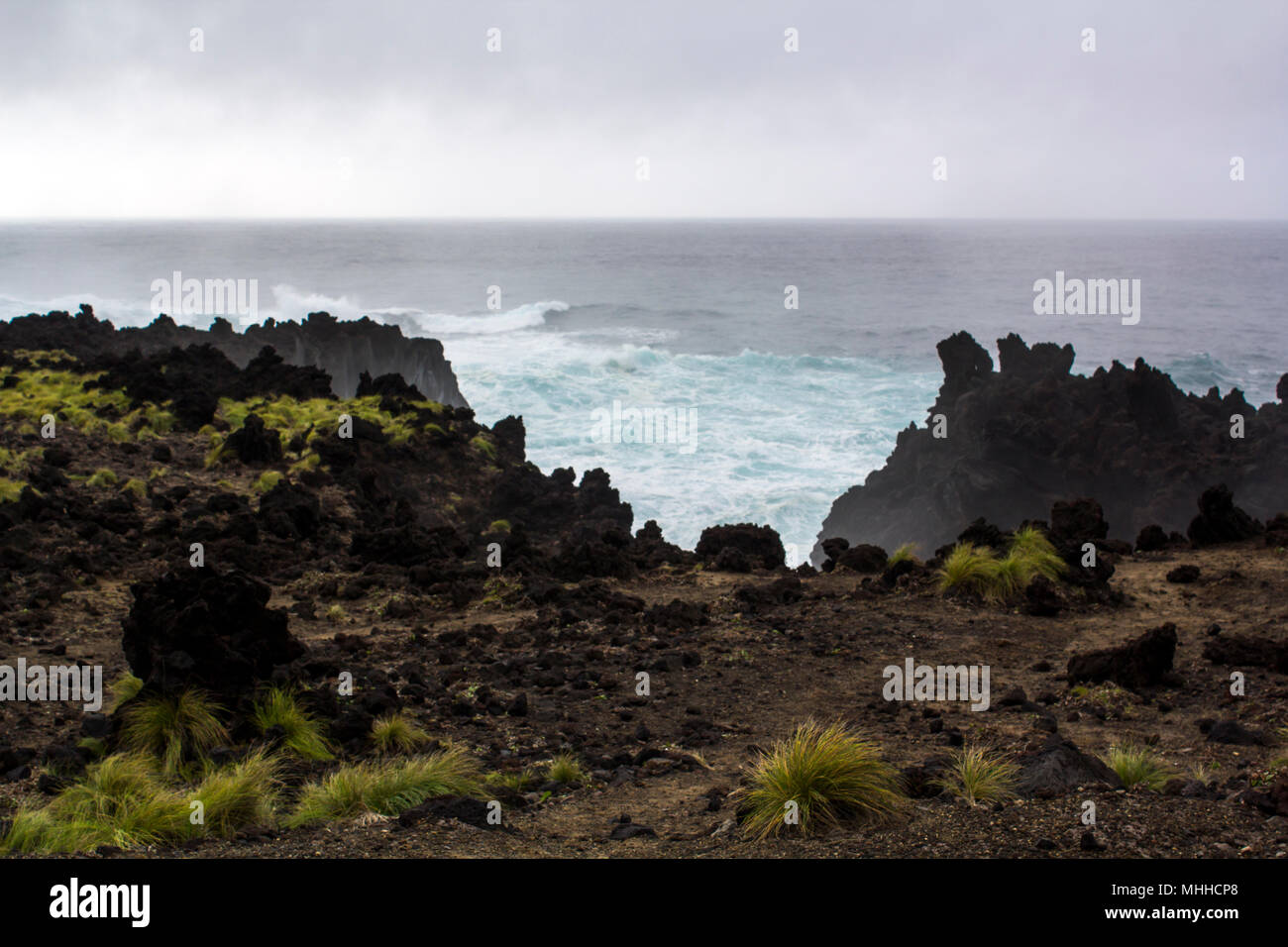 Black volcanic rocks wave hi-res stock photography and images - Alamy