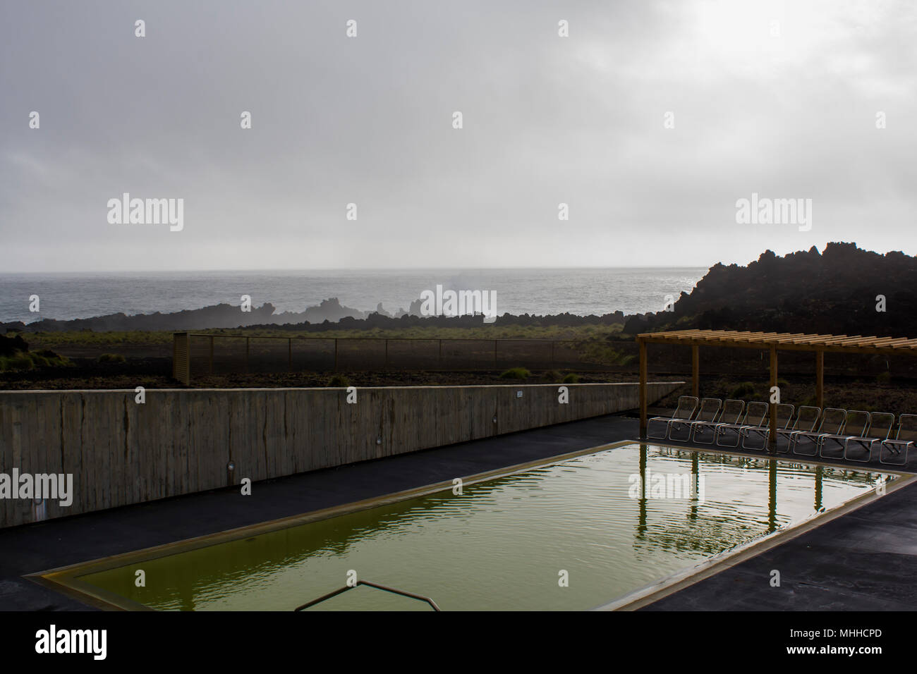 Thermal pool and atlantic ocean in Volcanic coastline. Stunning ...