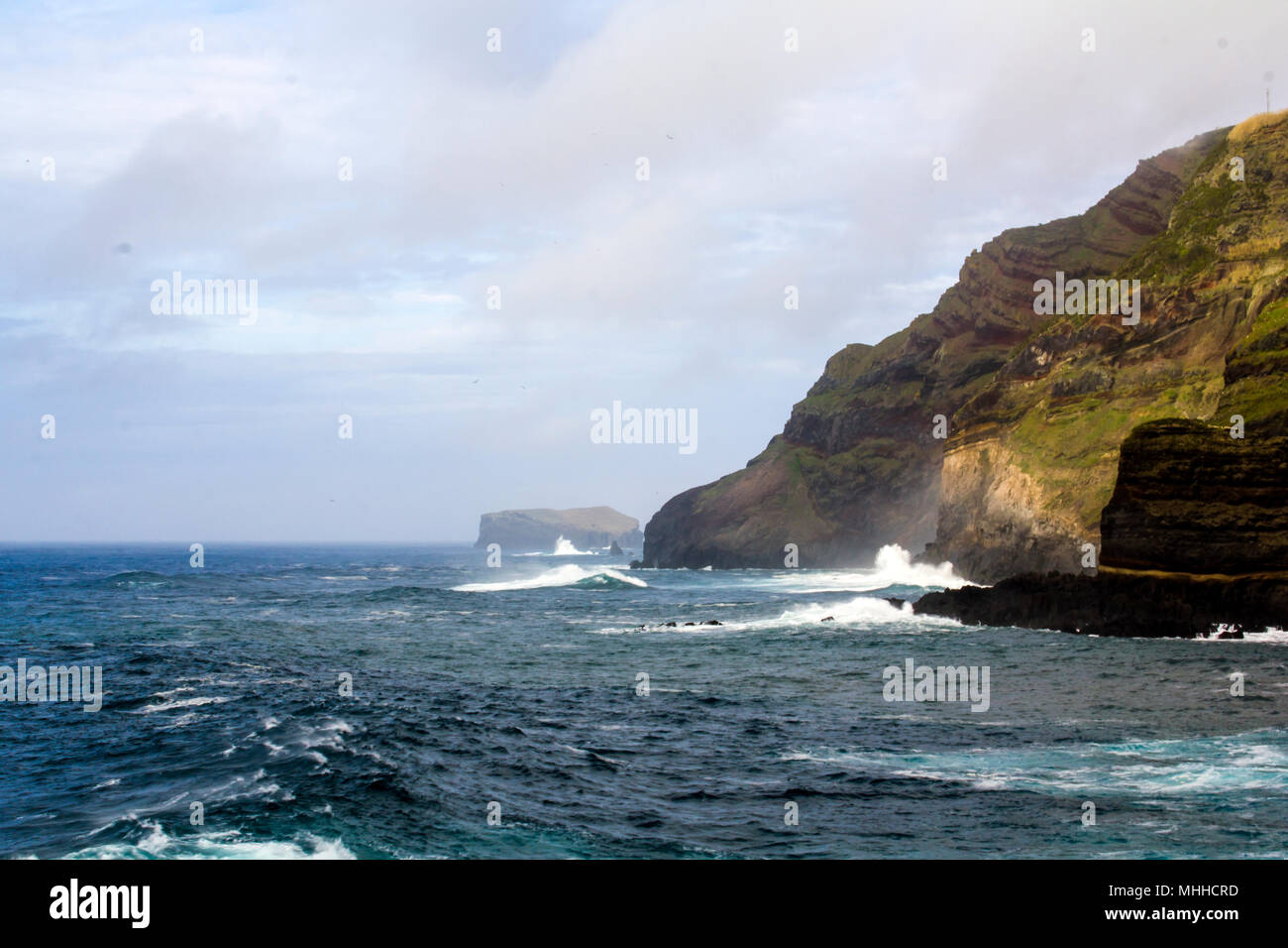 View of cliffs and seashore in Azores volcanic coastline Stock Photo ...