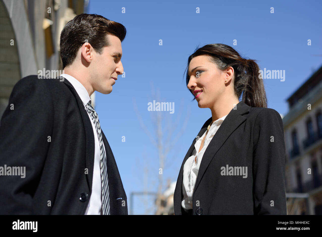 Executive business men talking outside hi-res stock photography and ...