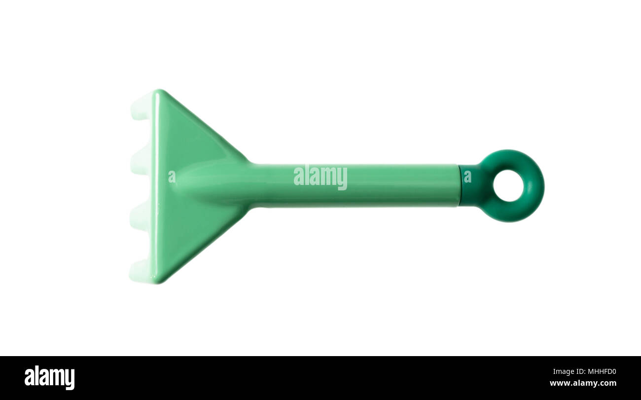 Kids gardening. Pastel green metal rake isolated on white background ...