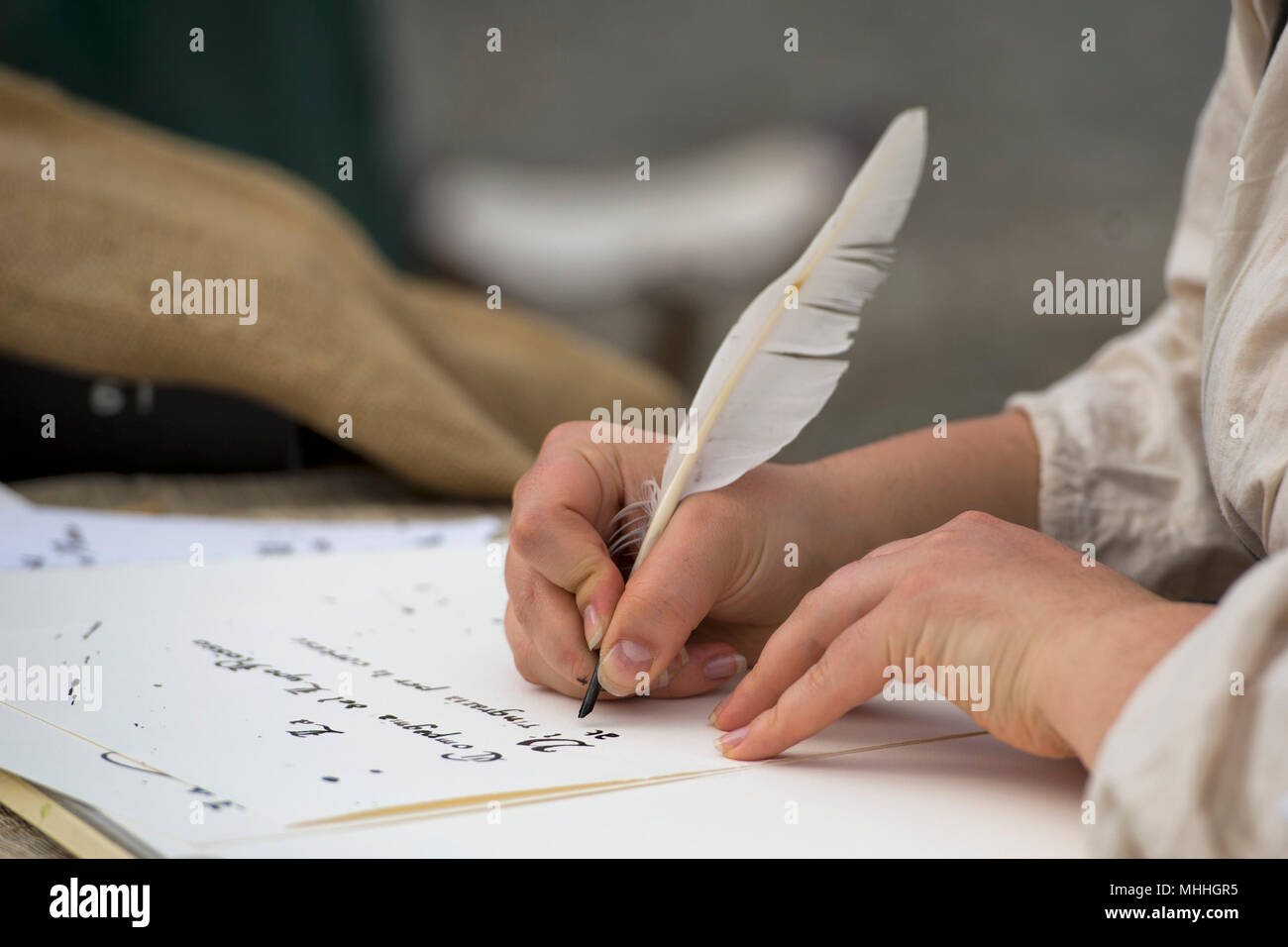 Hand writing quill pen, parchment paper hi-res stock photography and ...
