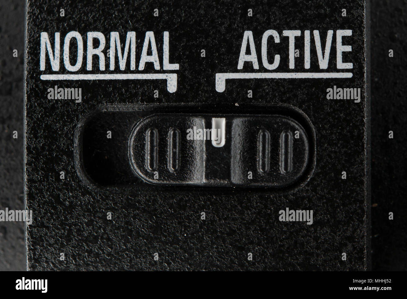 Normal Active switch on black background Stock Photo - Alamy