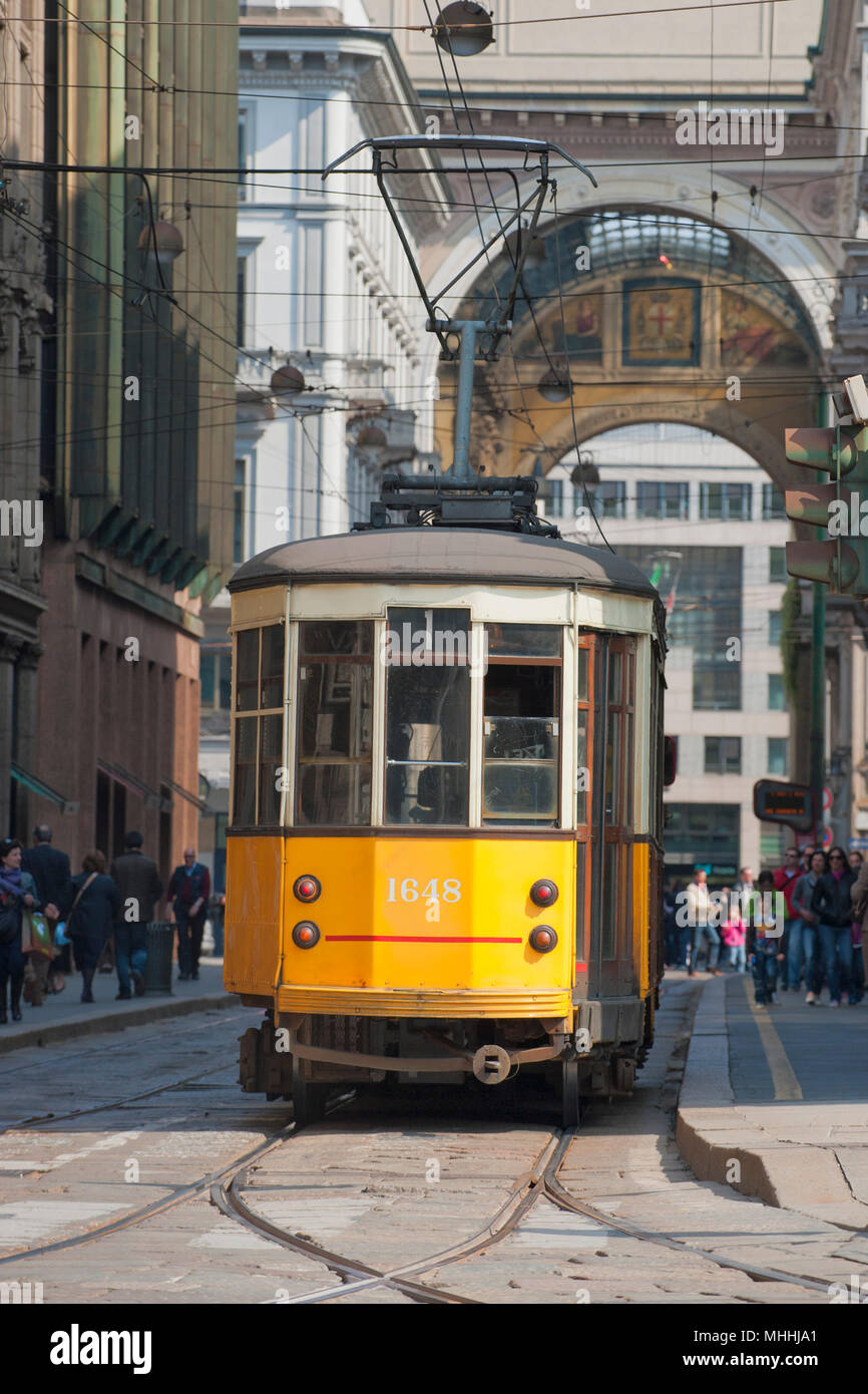 Milan orange cable car Stock Photo - Alamy