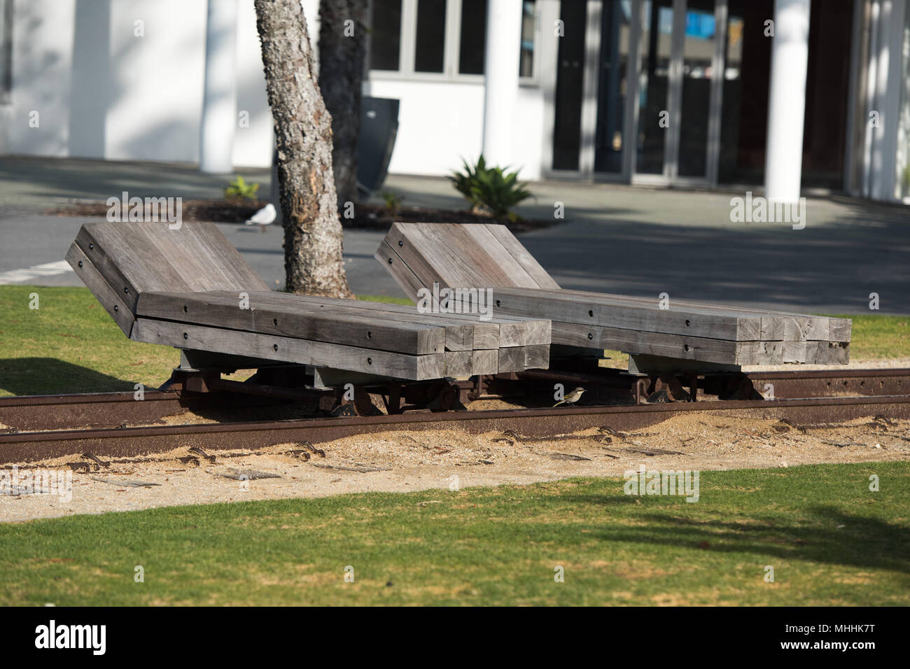solid wooden chaise longue on rail tracks Stock Photo - Alamy