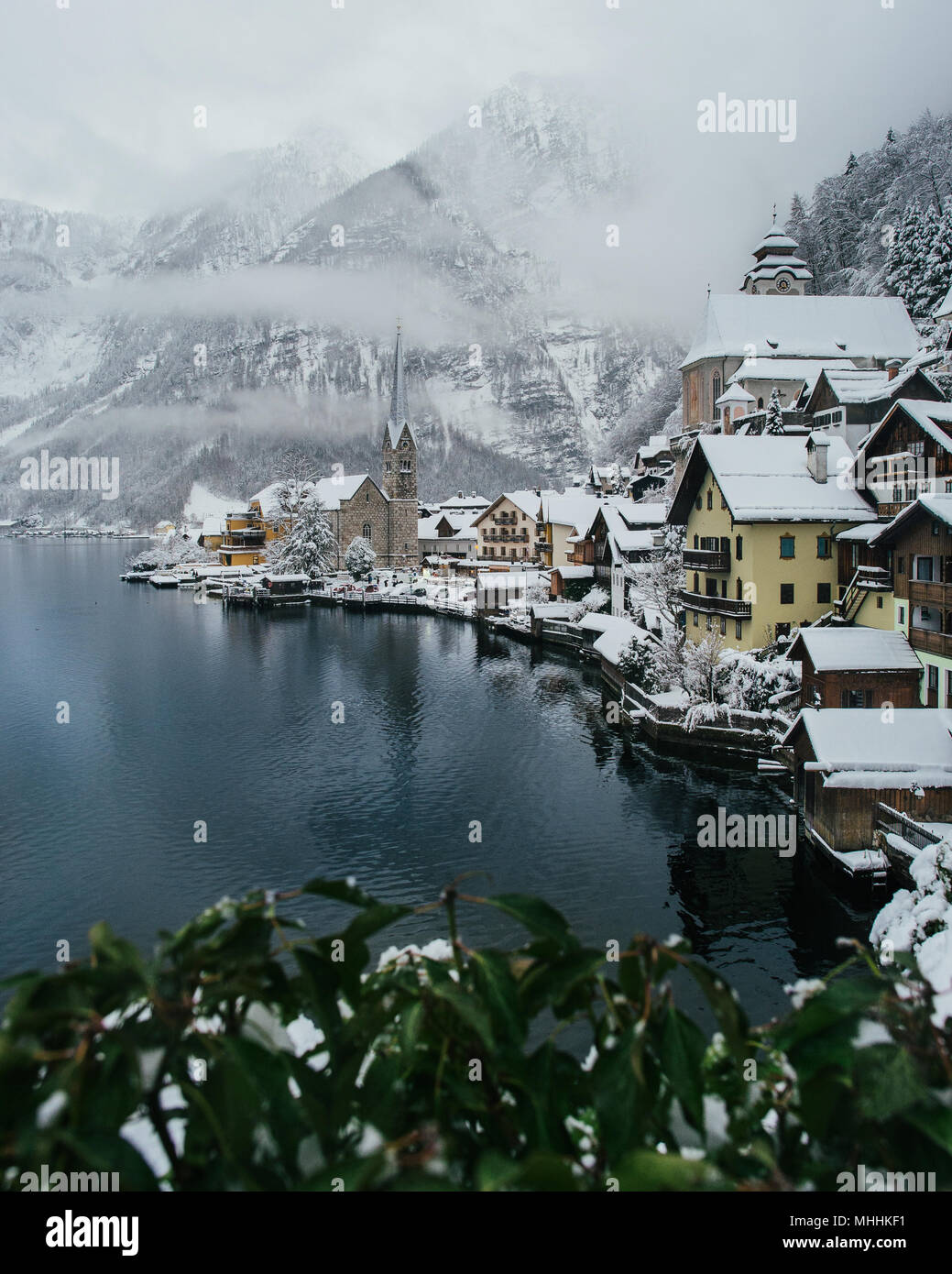 Scenic view of famous Hallstatt mountain village with Hallstatter lake ...