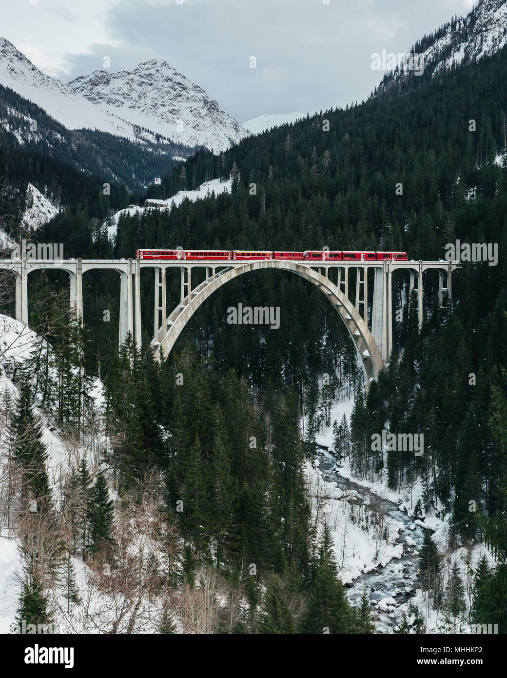 Scenic view of bridge- viaduct with train in Switzerland Stock Photo ...