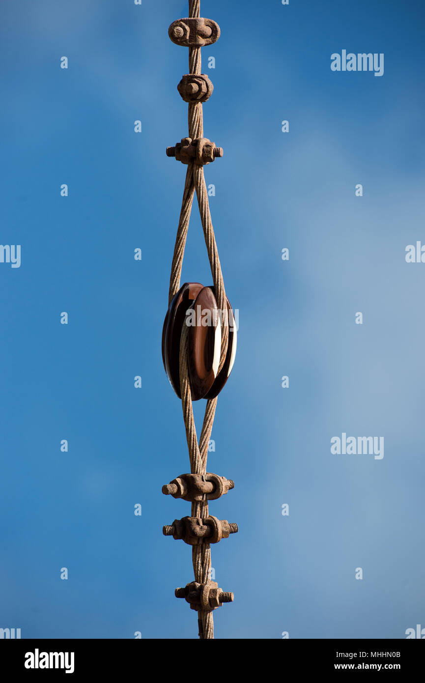 iron steel cables on the sky background Stock Photo - Alamy