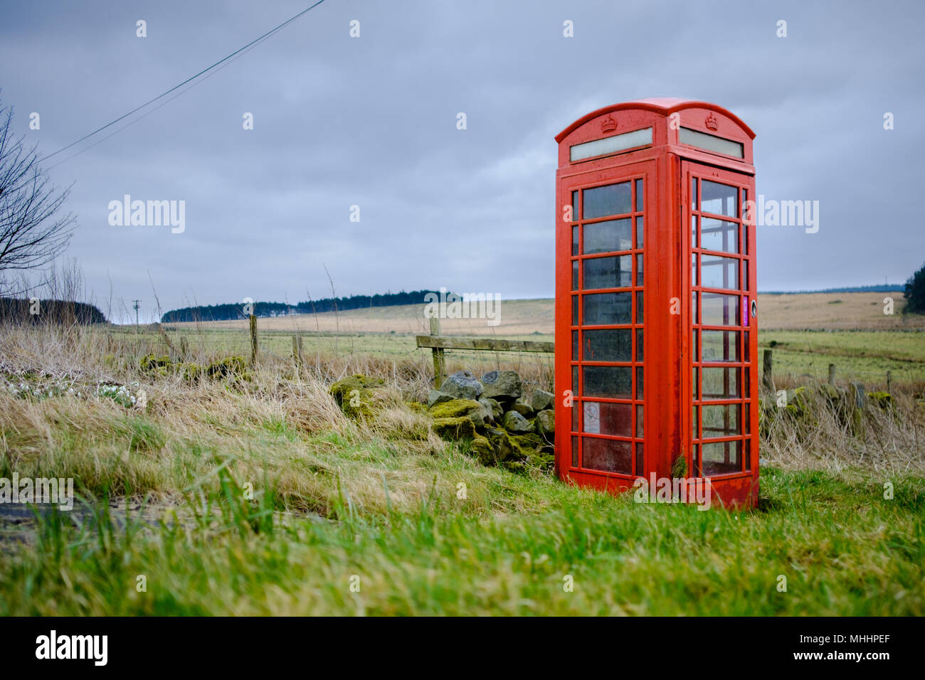 A disused red BT telephone box in the rural countryside Stock Photo - Alamy