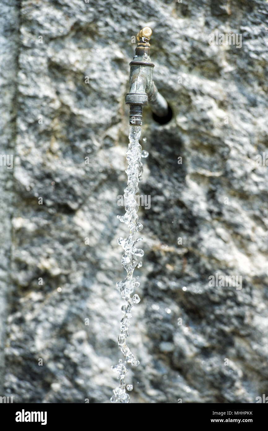 Blue water tap falling drop hi-res stock photography and images - Alamy