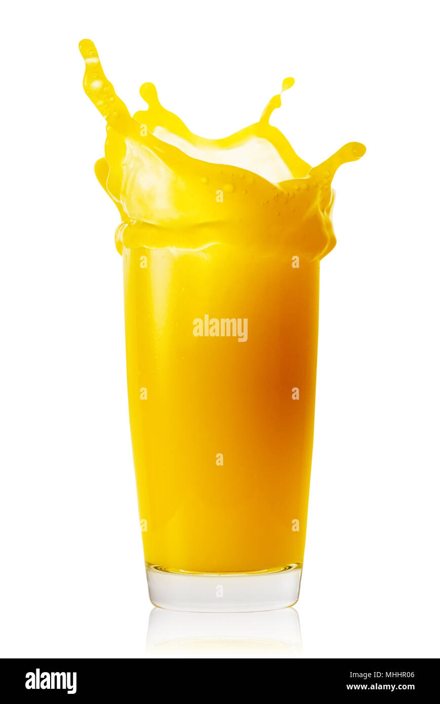 Splash in transparent glass of orange juice Stock Photo - Alamy