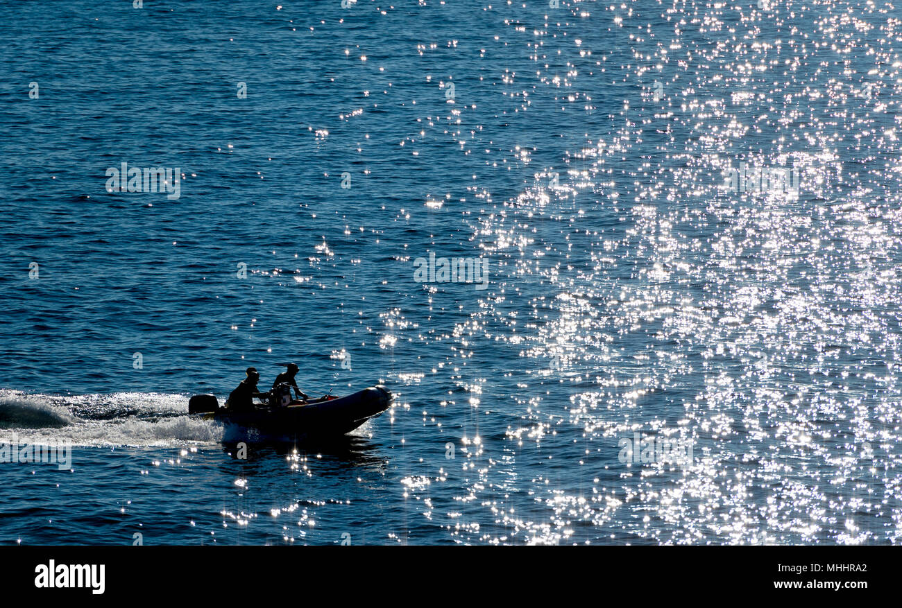 Girl on inflatable boat hi-res stock photography and images - Alamy
