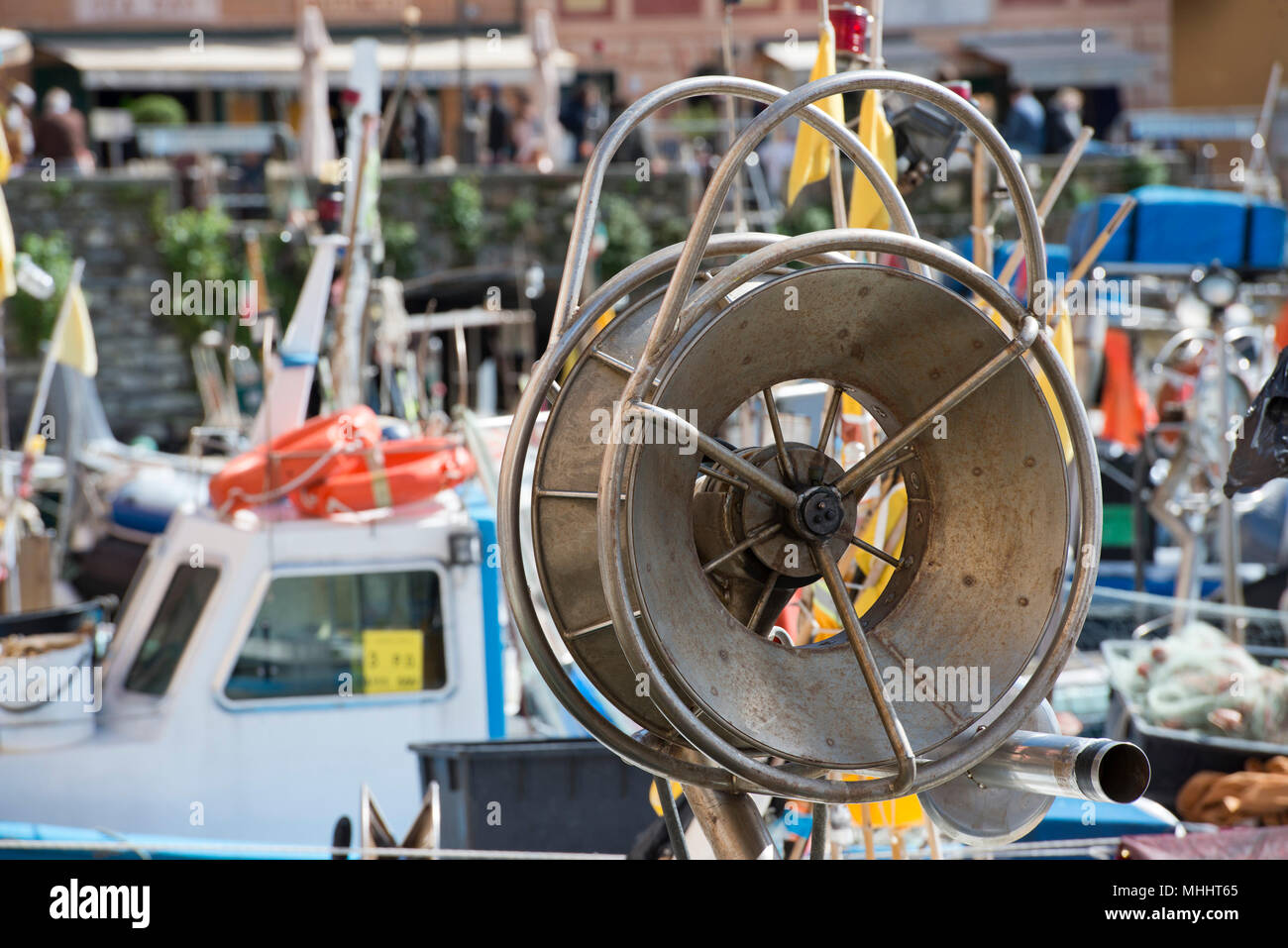 Fisherman net boat net metallic handler Stock Photo - Alamy