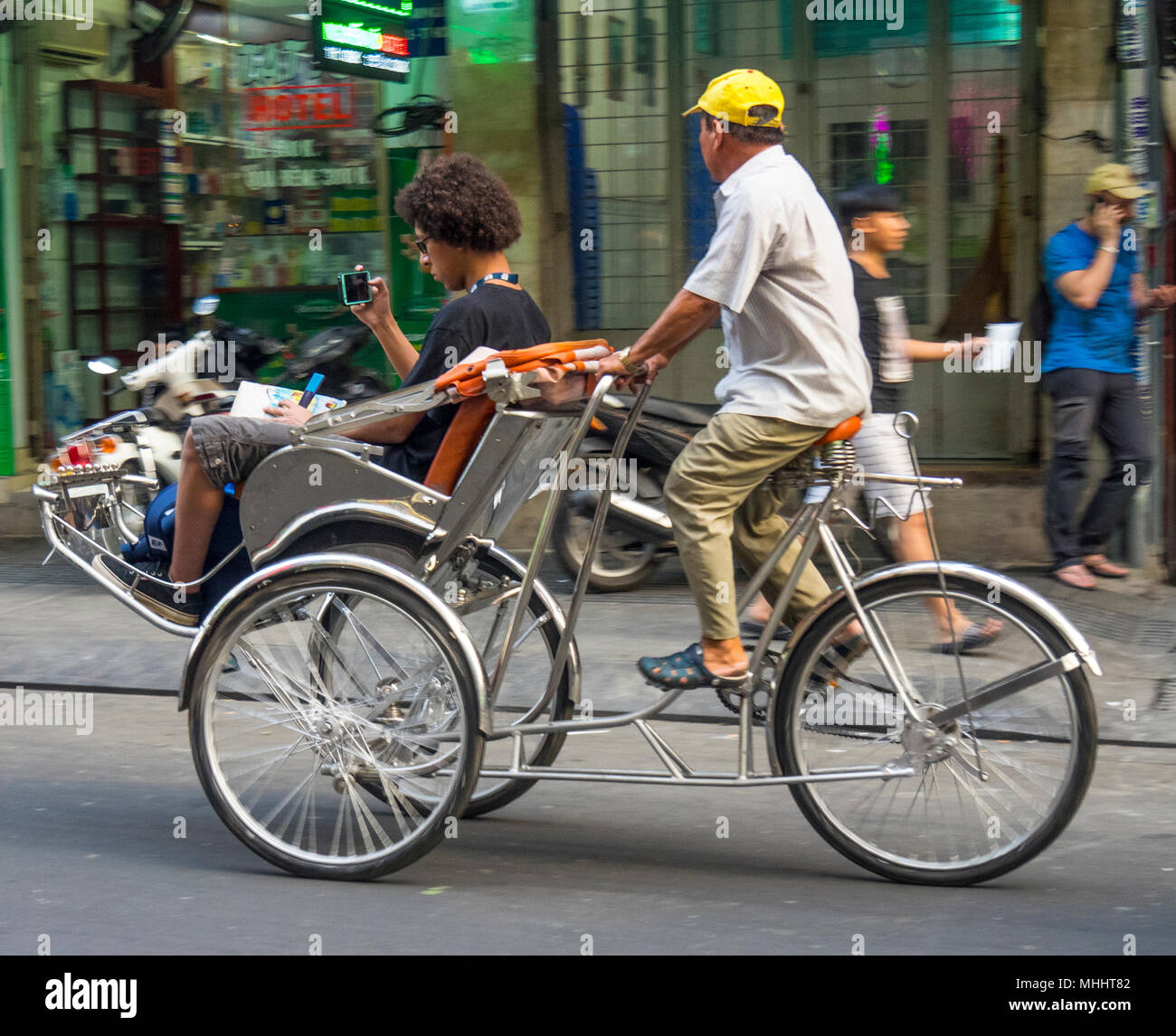 Traditional vietnamese riding cycle hi-res stock photography and images ...