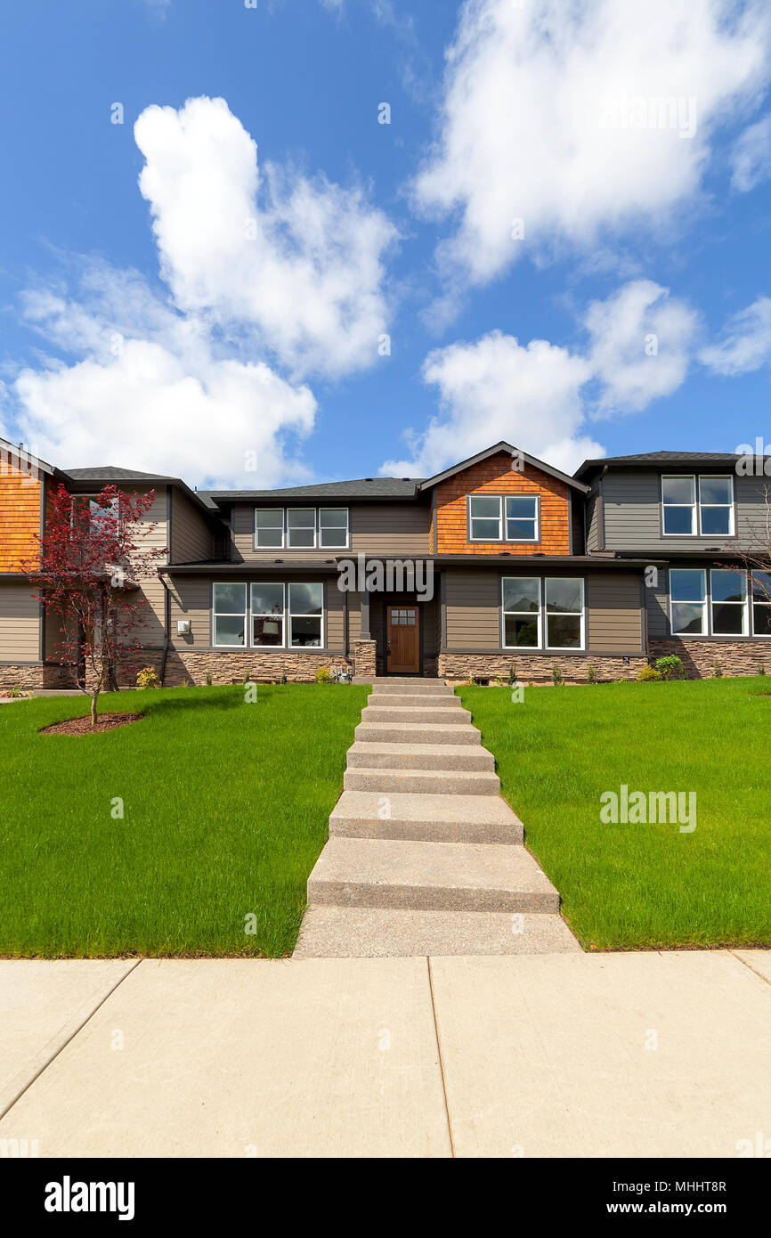 Concrete stair steps to new townhome door entrance front yard in North ...
