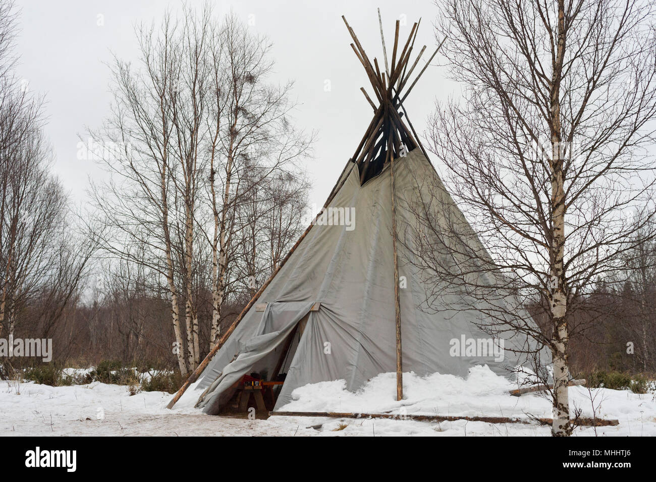 tepee in the snow of arctic night background Stock Photo - Alamy