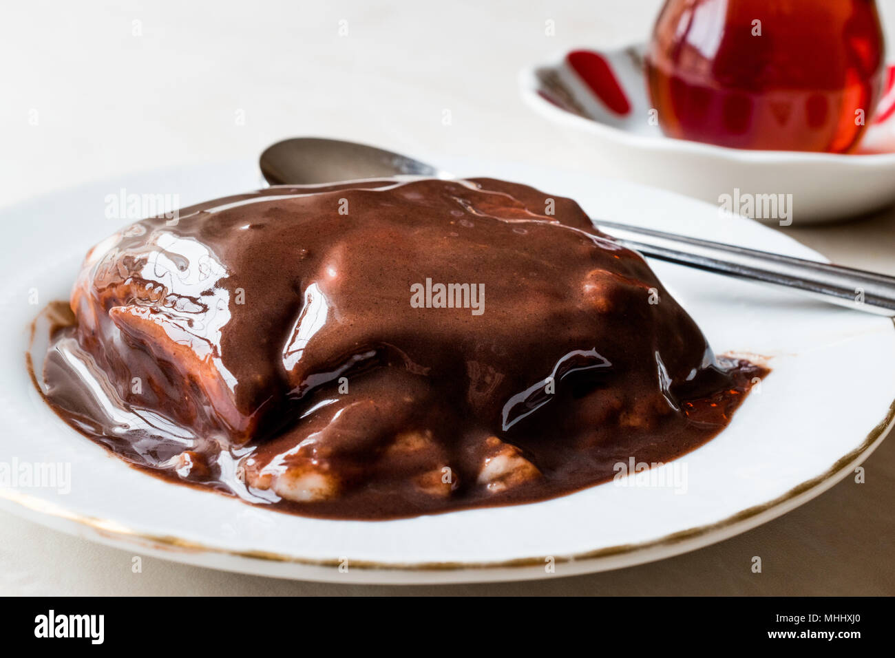 Turkish Pudding Muhallebi with Chocolate Sauce and Traditional Tea ...