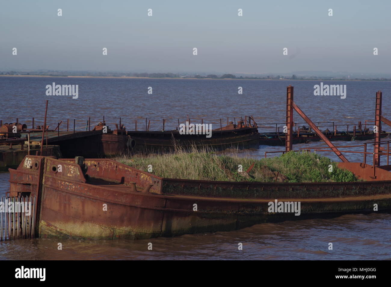 Rotting, abandoned, derelict barges at Paull, near Hull, UK Stock Photo ...