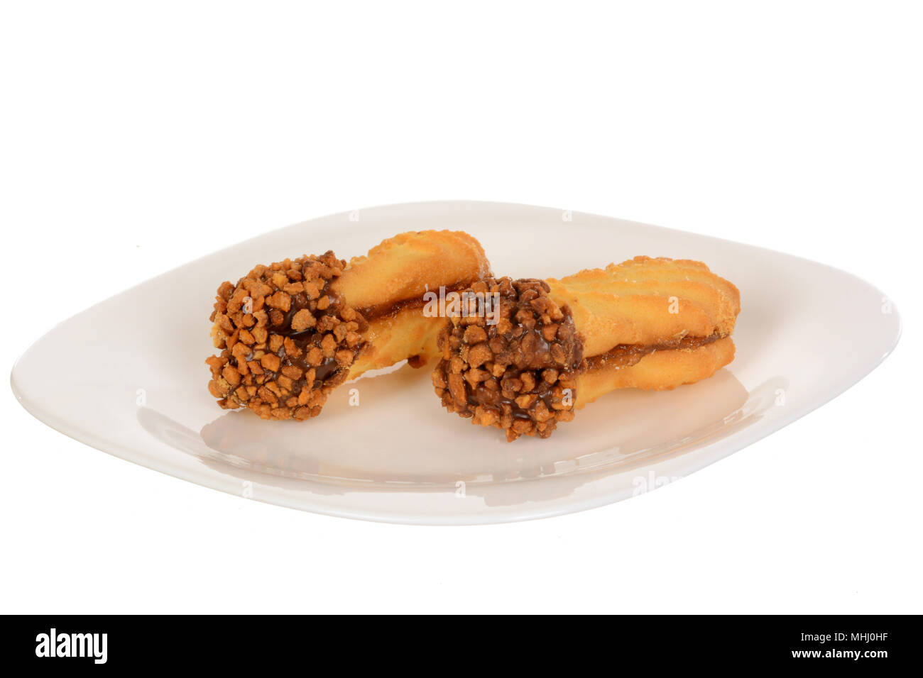 Sandwich cookies, oval shape filled with chocolate cream Stock Photo ...