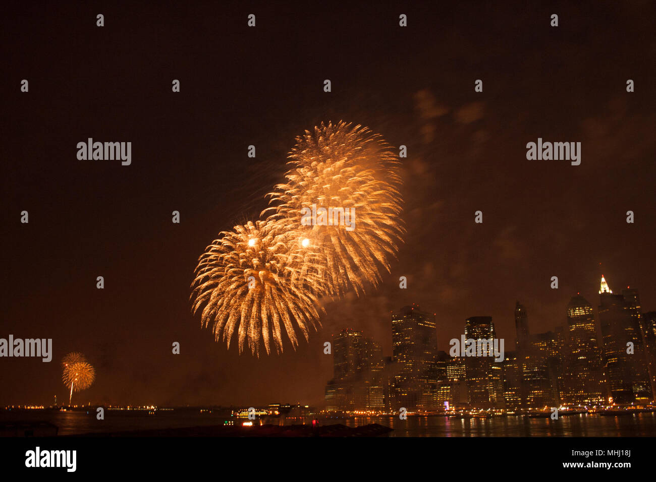 4th of July Fireworks by Downtown Manhattan view from Brooklyn, NY USA ...