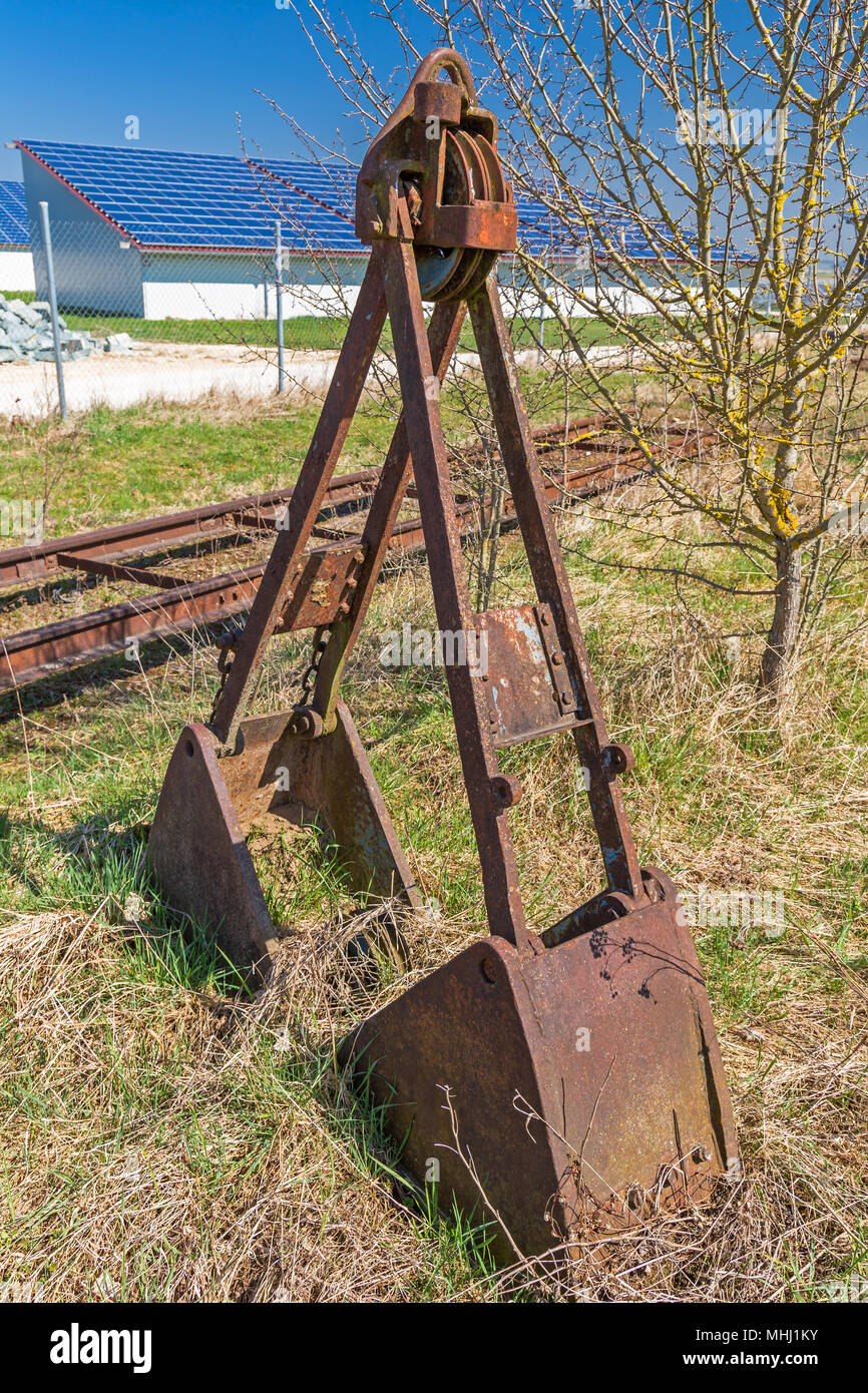 Old rusted excavator bucket Stock Photo - Alamy