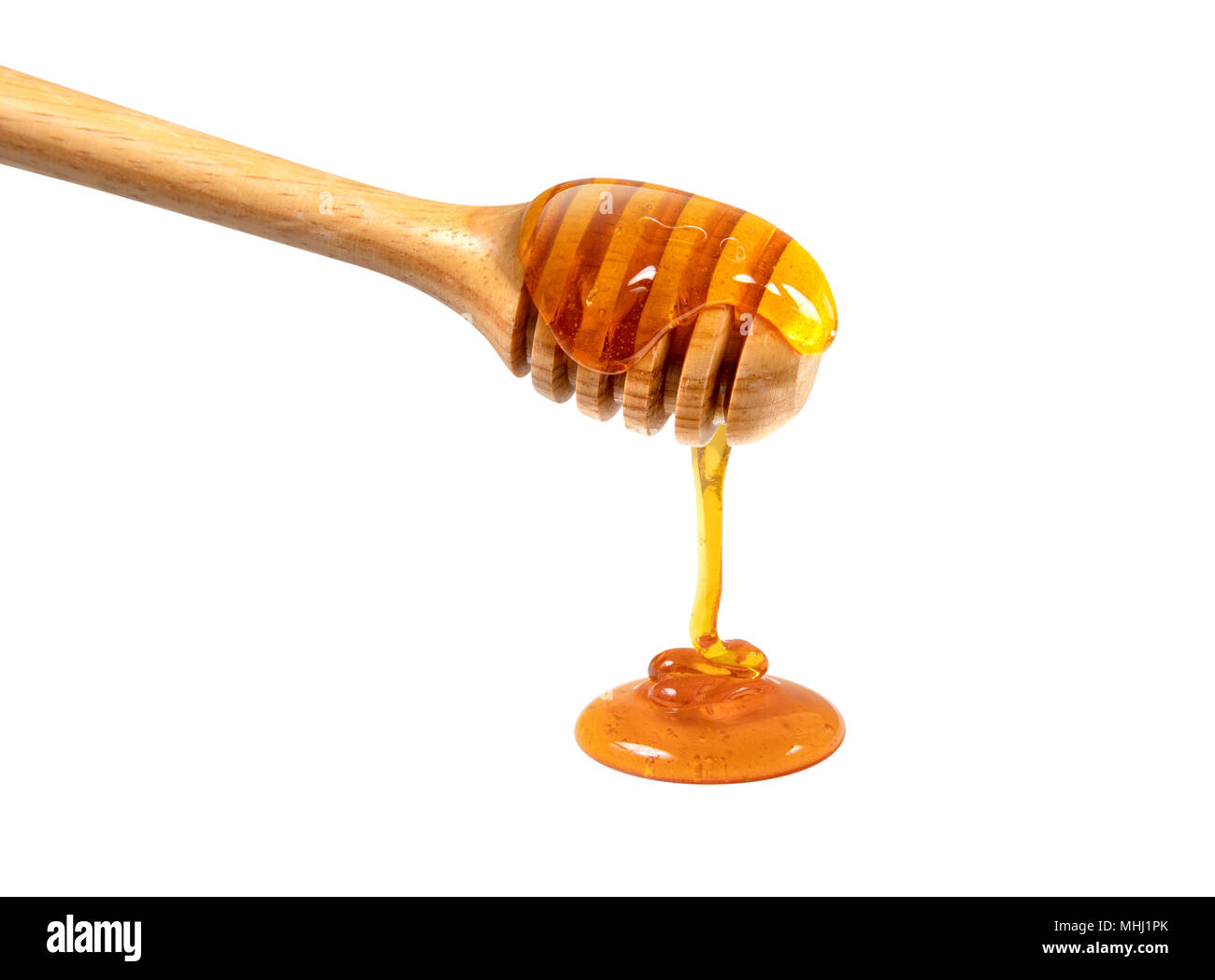 honey and honey comb with wooden stick Stock Photo - Alamy