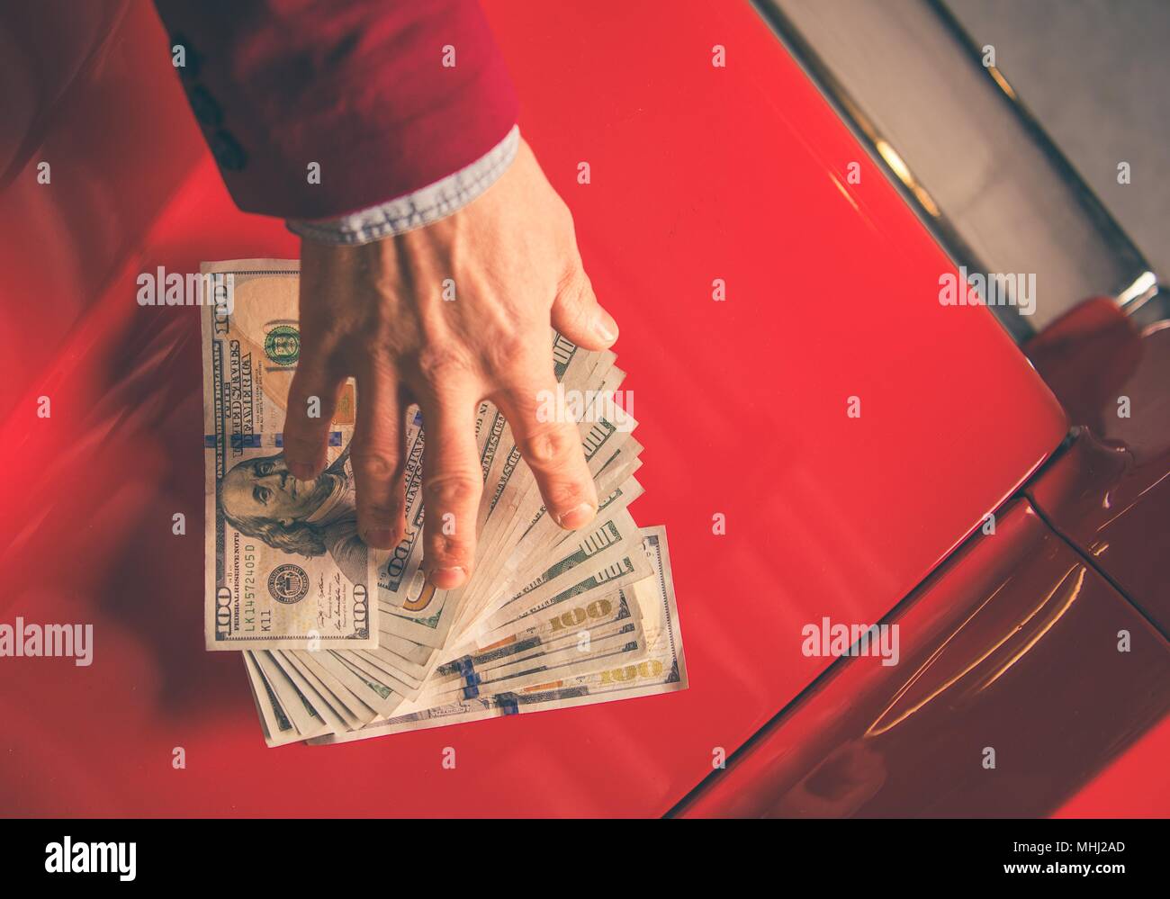 Paying For the Car. Caucasian Men Giving Thousand Dollars For the Aged ...