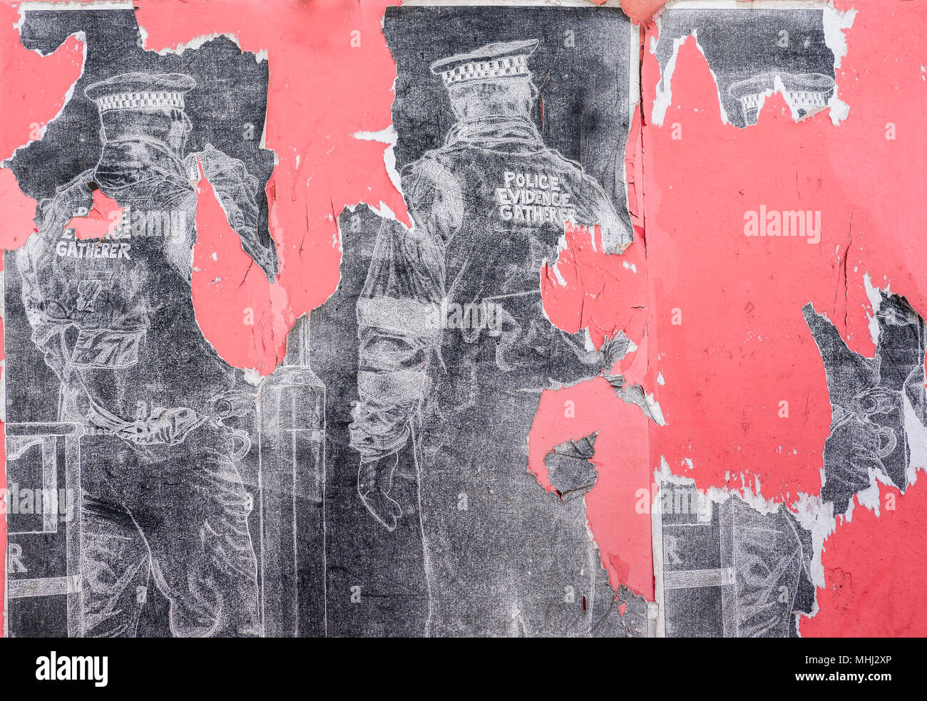 An old, torn poster depicting police officers gathering evidence of ...