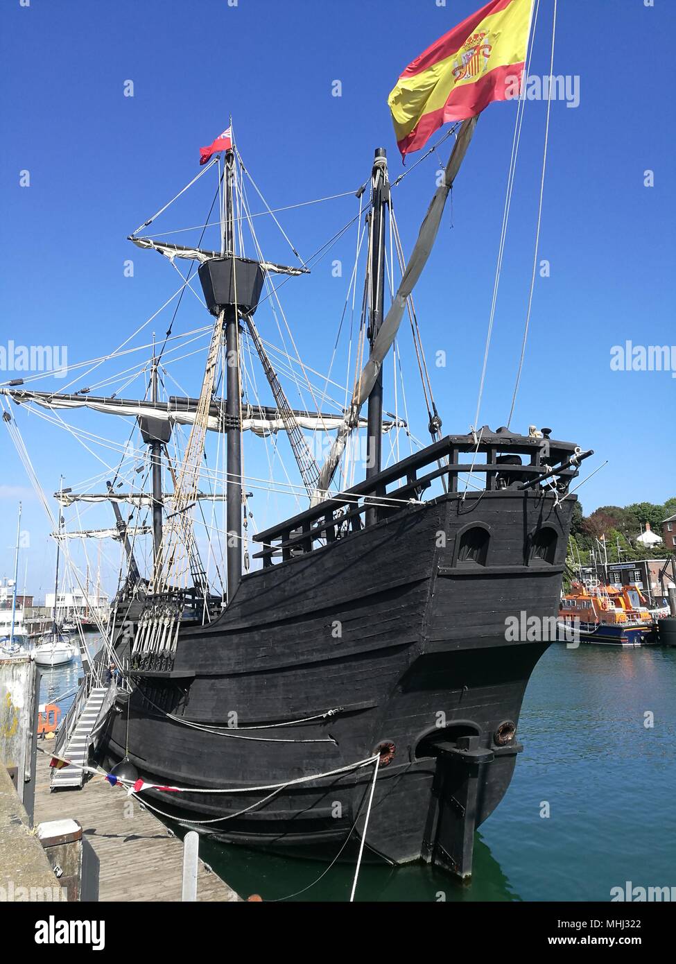 Black pirate looking historic ship in weymouth harbour Stock Photo - Alamy