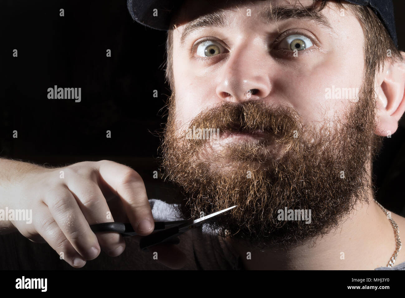 Black man cuts hair hi-res stock photography and images - Alamy