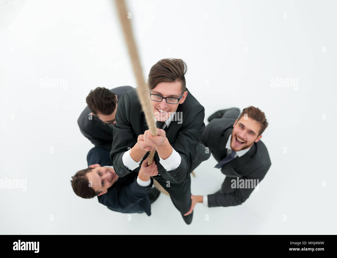 business team helping the leader to climb the rope Stock Photo - Alamy