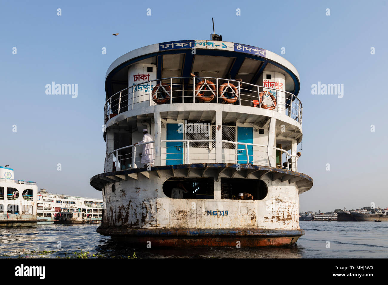 Dhaka, Bangladesh, February 24 2017: Old rusty ferry on the Buriganga ...