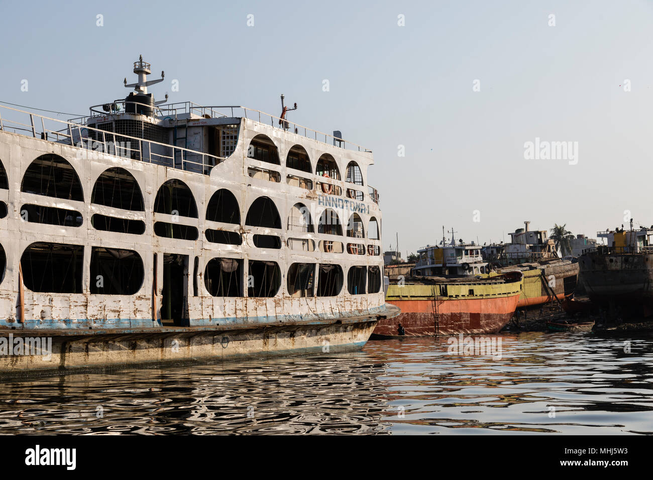 Dhaka, Bangladesh, February 24 2017: Old rusty ferry on the Buriganga ...