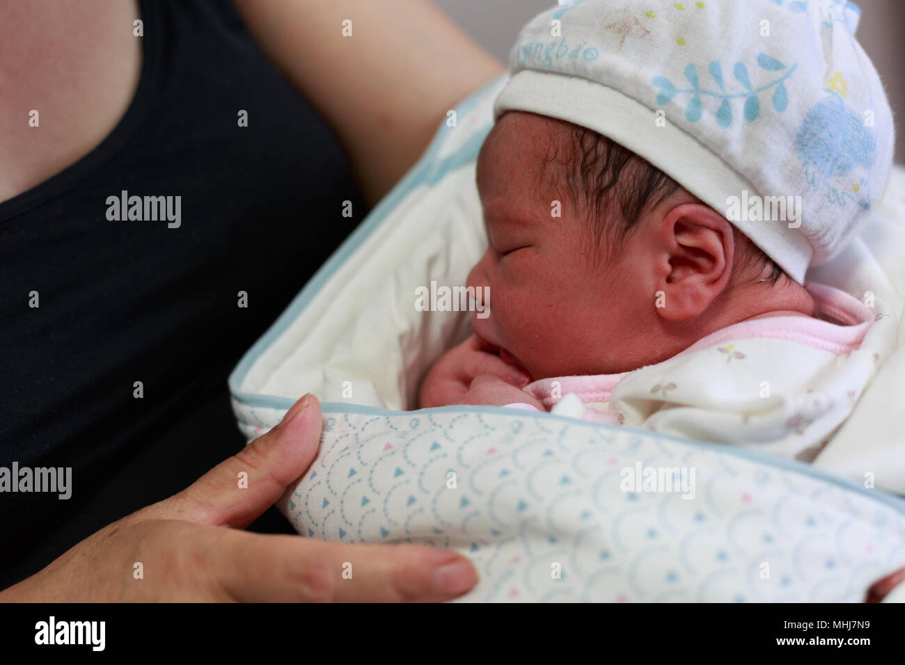 An Asian baby boy just one day old Stock Photo - Alamy