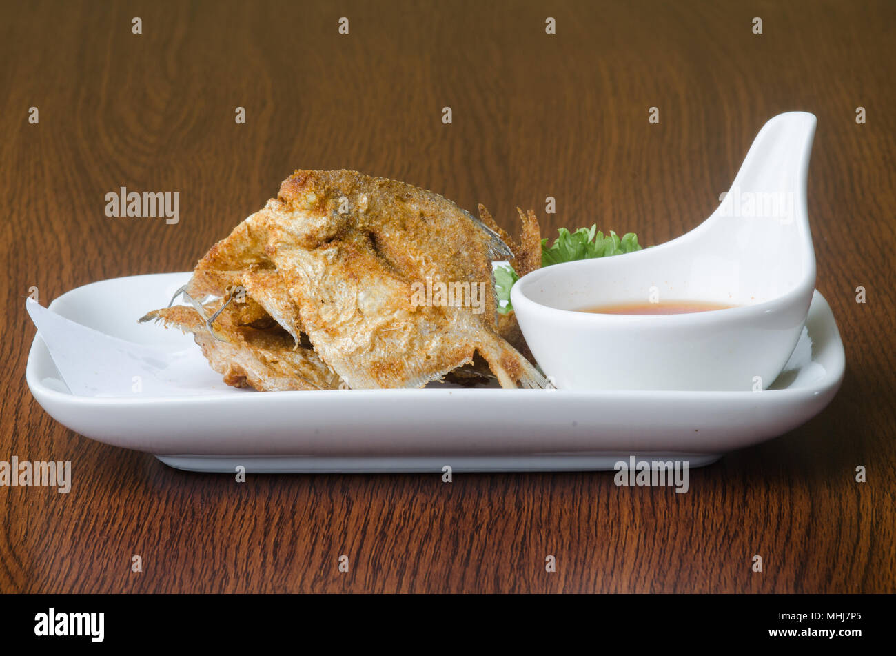 japanese cuisine. fried fish on background Stock Photo - Alamy