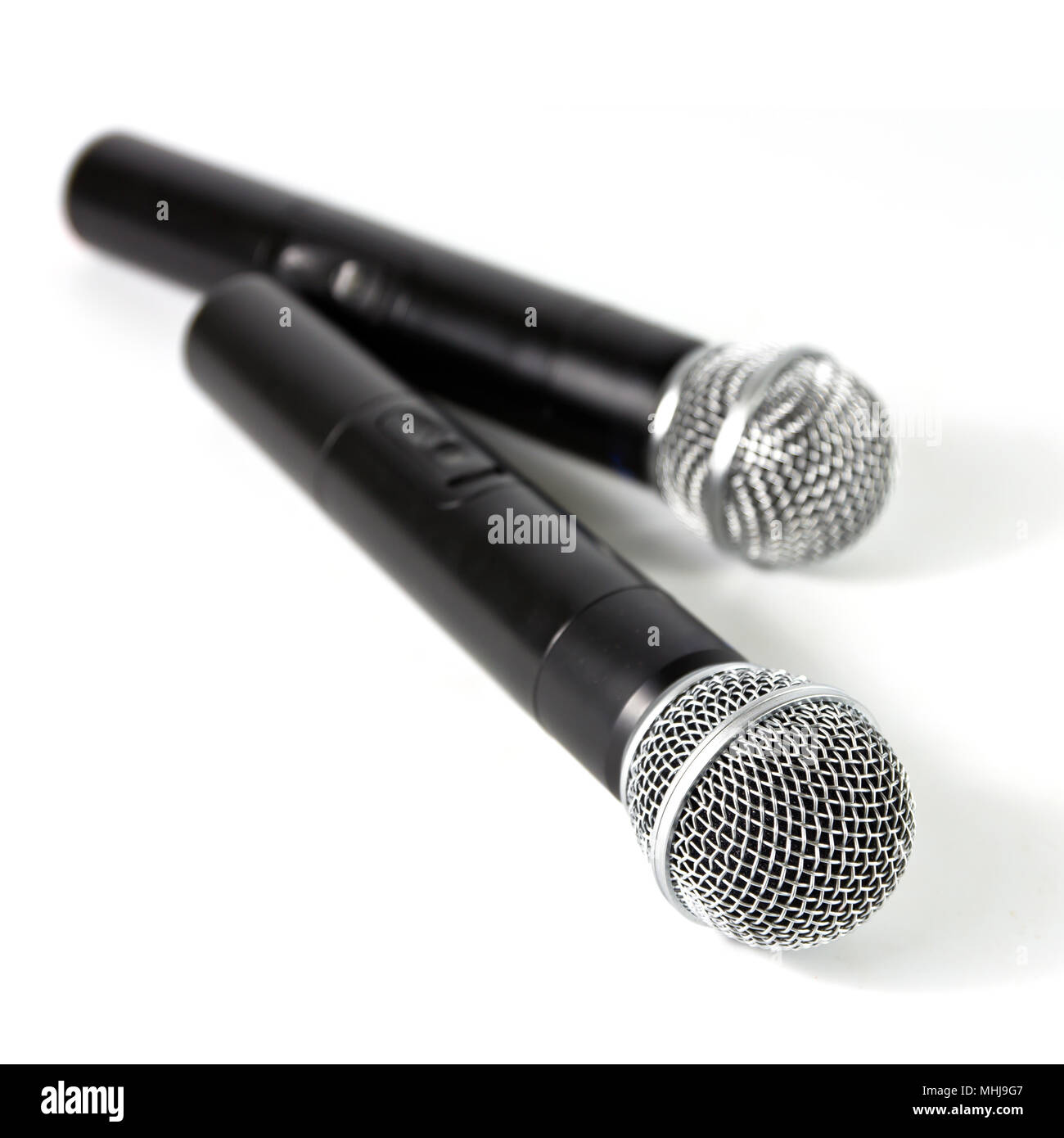 Two microphone wireless on white background Stock Photo - Alamy