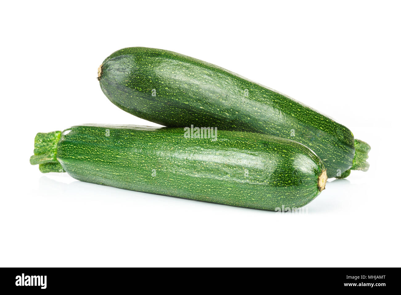 Zucchini courgette isolated on a white background in close-up Stock ...