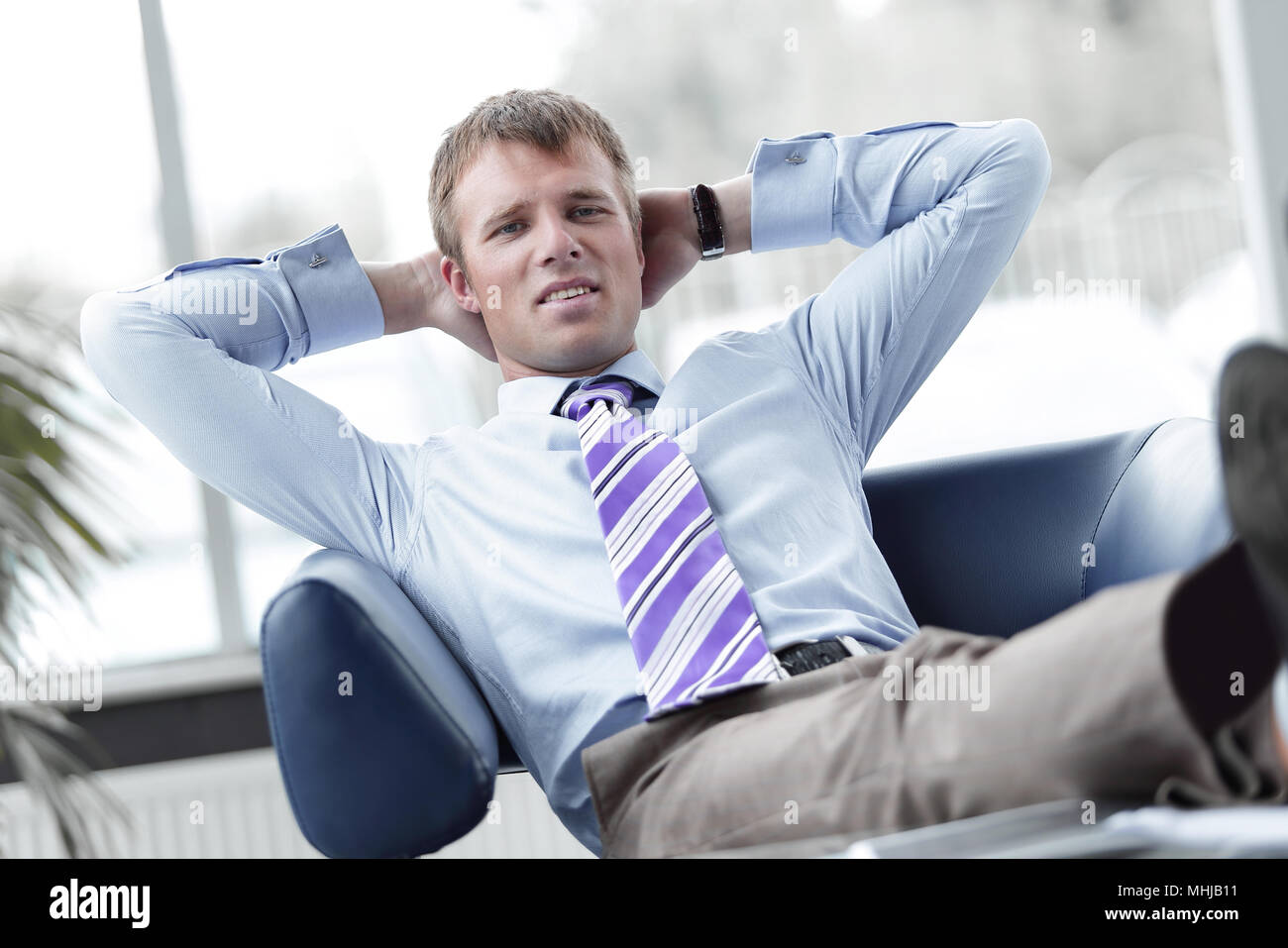 Businessman leaning back hi-res stock photography and images - Alamy