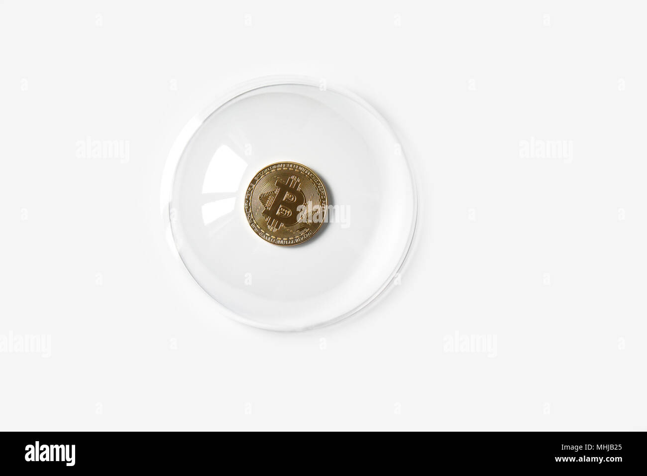 bitcoin cryptocurrency concept, physical coin inside a bubble on white ...