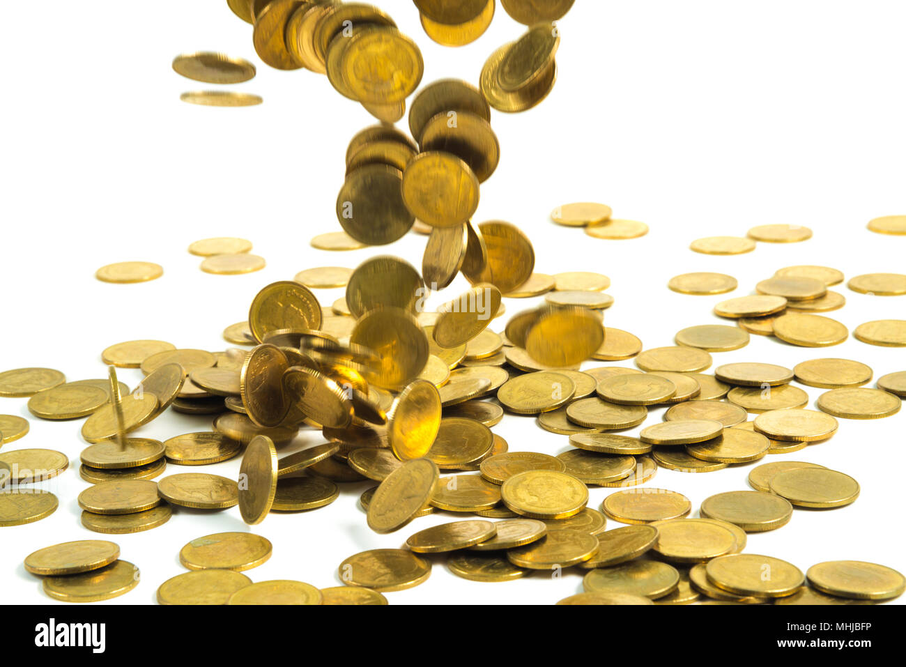 Falling gold coins money isolated on the white background, business ...