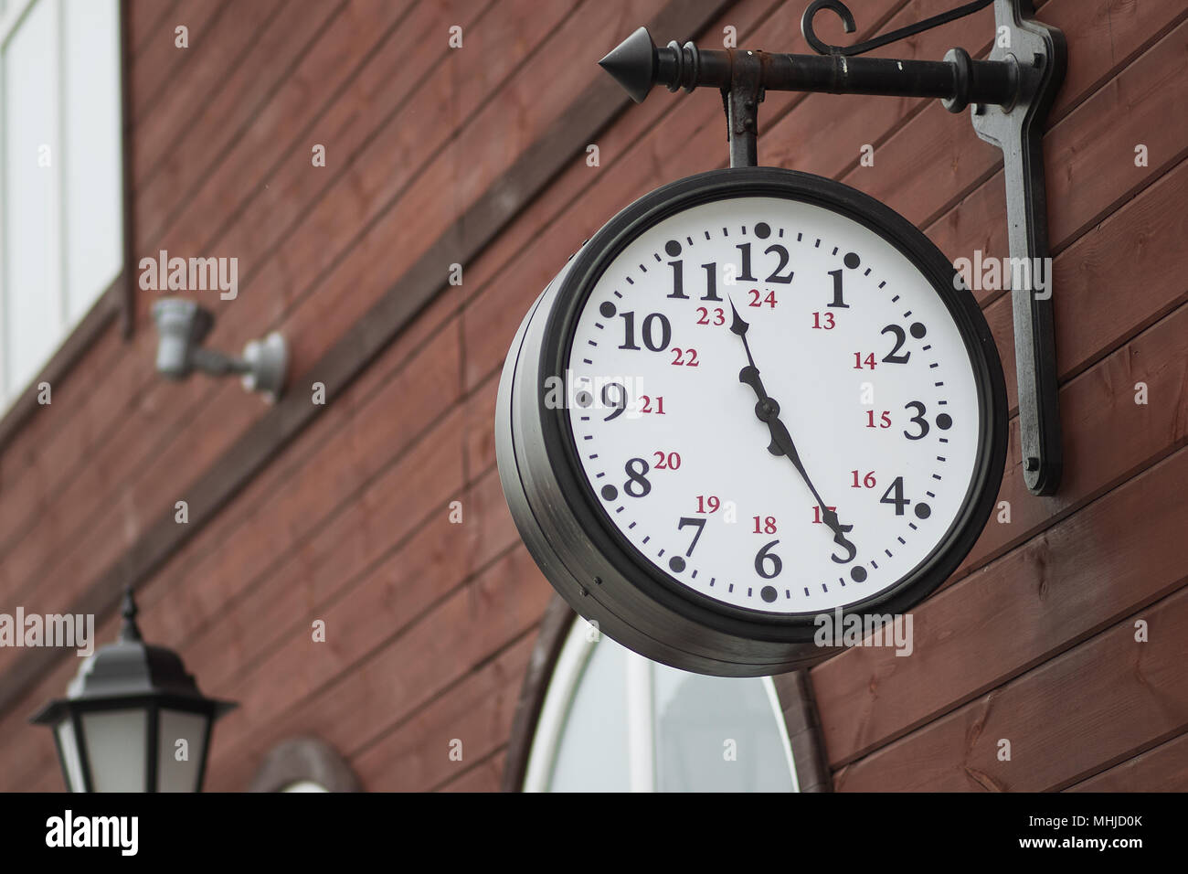 Urban historical architecture with vintage clock in street in London ...